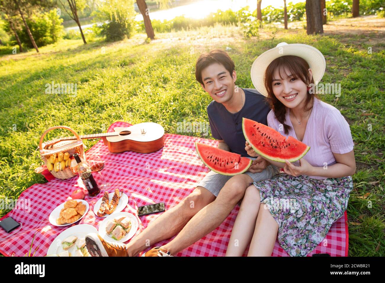 Happy couples in the park for an outing Stock Photo - Alamy