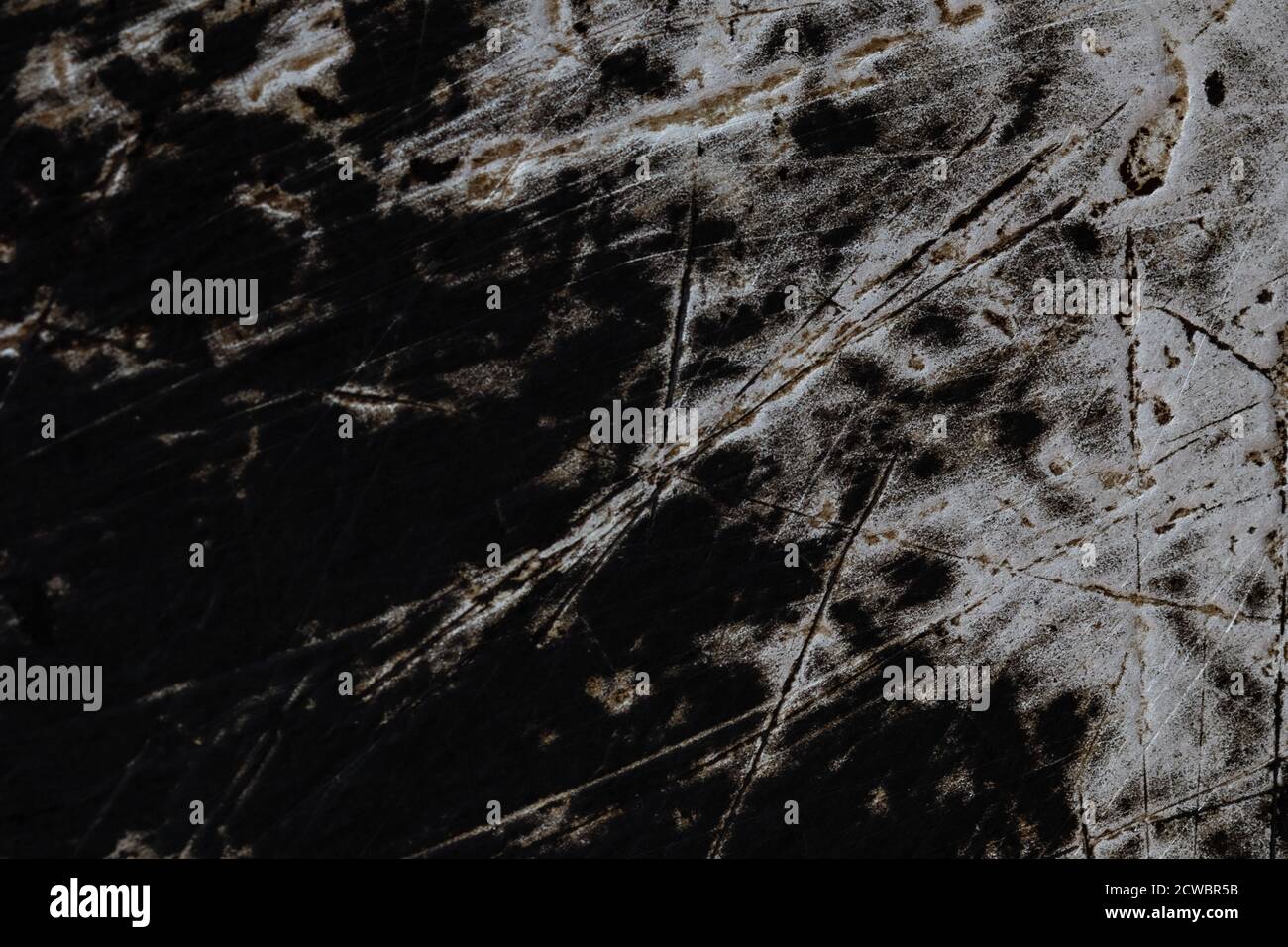 Texture of a rock with cracks, an abstract backdrop Stock Photo - Alamy