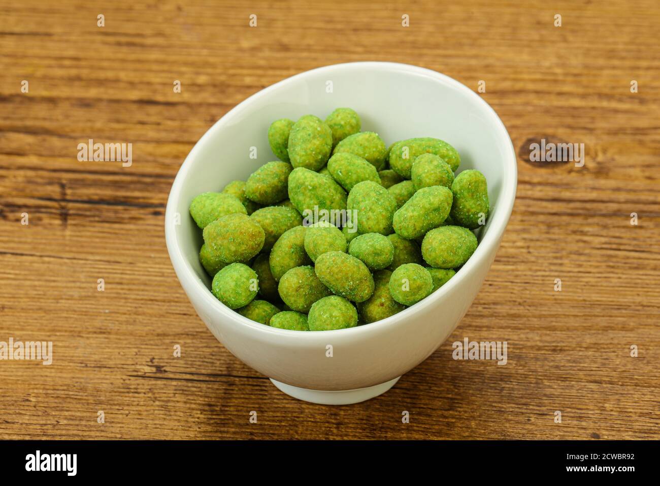 Spicy wasabi peanuts snack in the bowl Stock Photo - Alamy