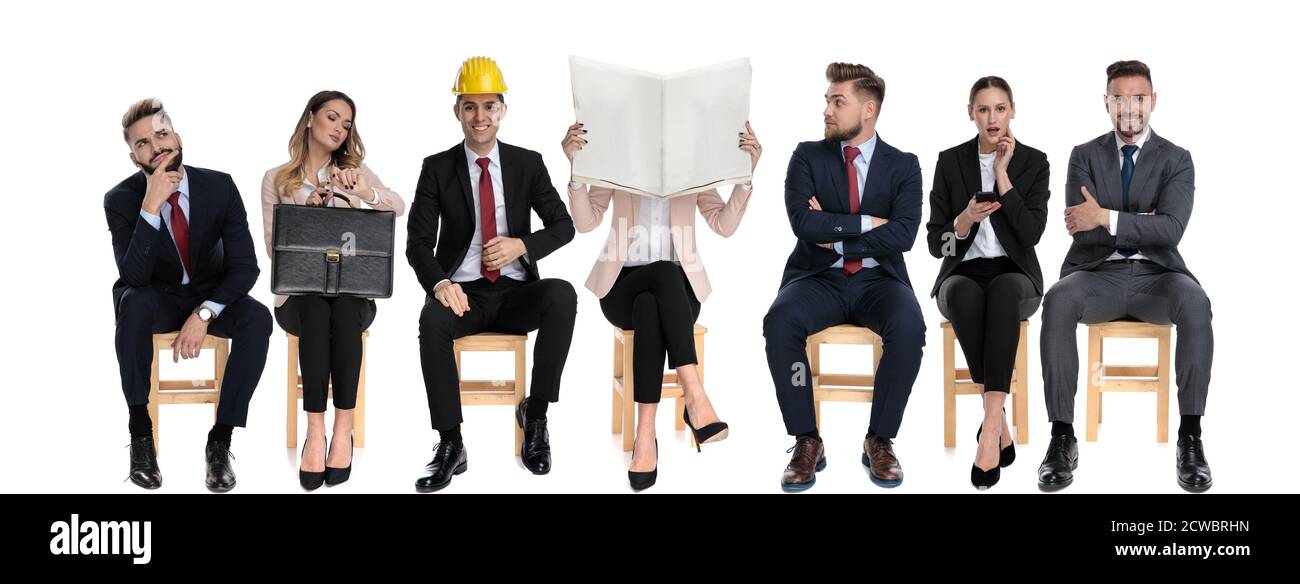 Interview newspaper seated reading hi-res stock photography and images ...