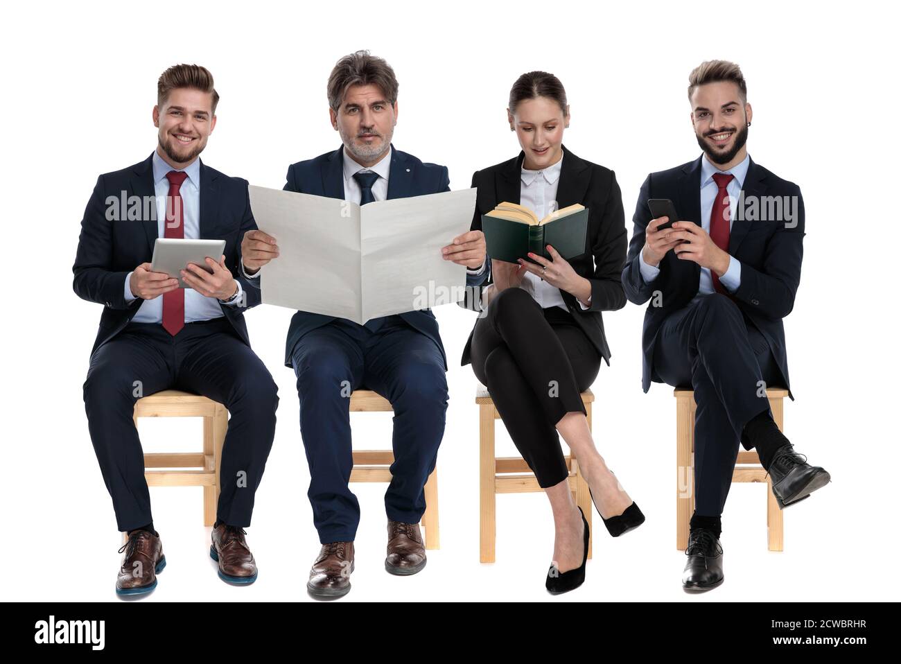 Interview newspaper seated reading hi-res stock photography and images ...