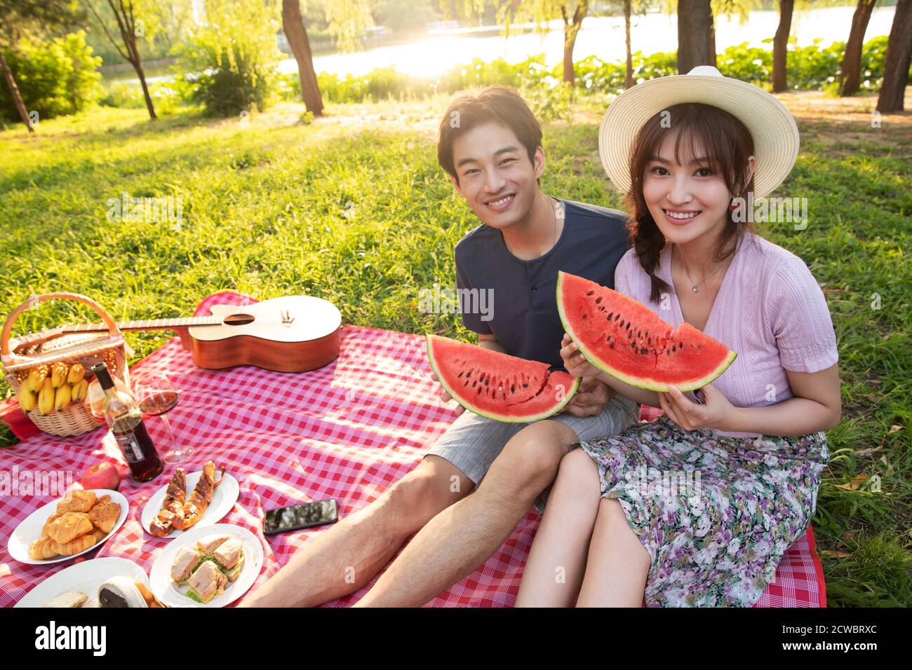 Happy couples in the park for an outing Stock Photo - Alamy