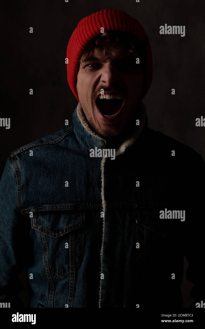 Man wearing red jacket jeans hi-res stock photography and images - Alamy