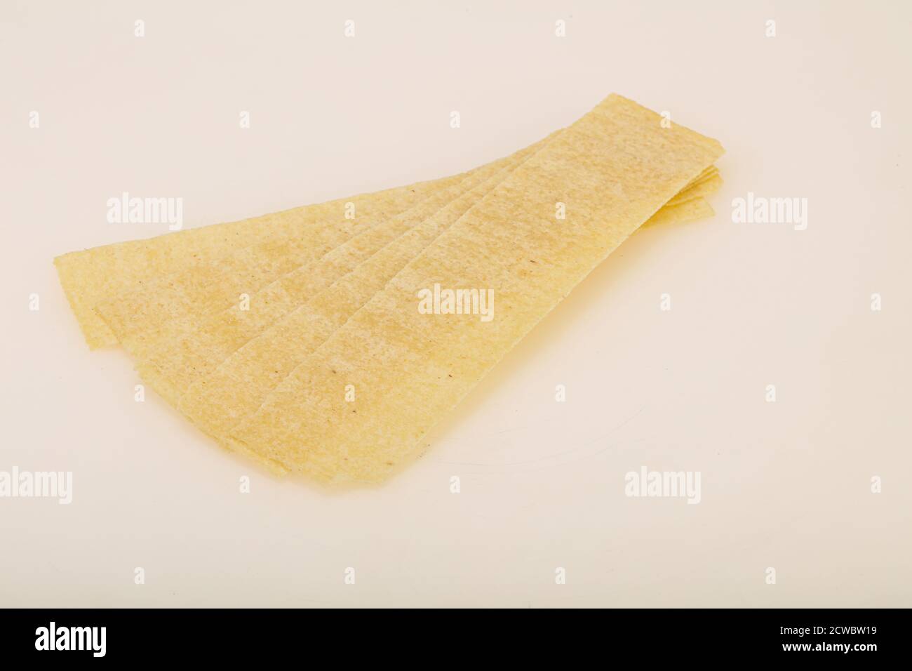 Natural fat and salted potato chips heap Stock Photo - Alamy
