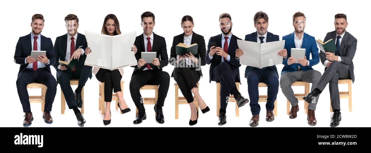 Interview newspaper seated reading hi-res stock photography and images ...