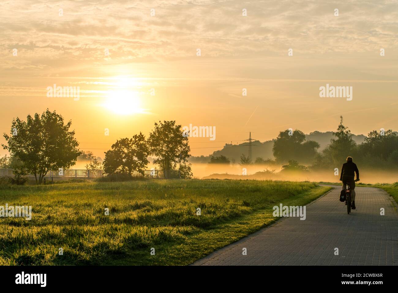Commuting by e bike hi-res stock photography and images - Alamy