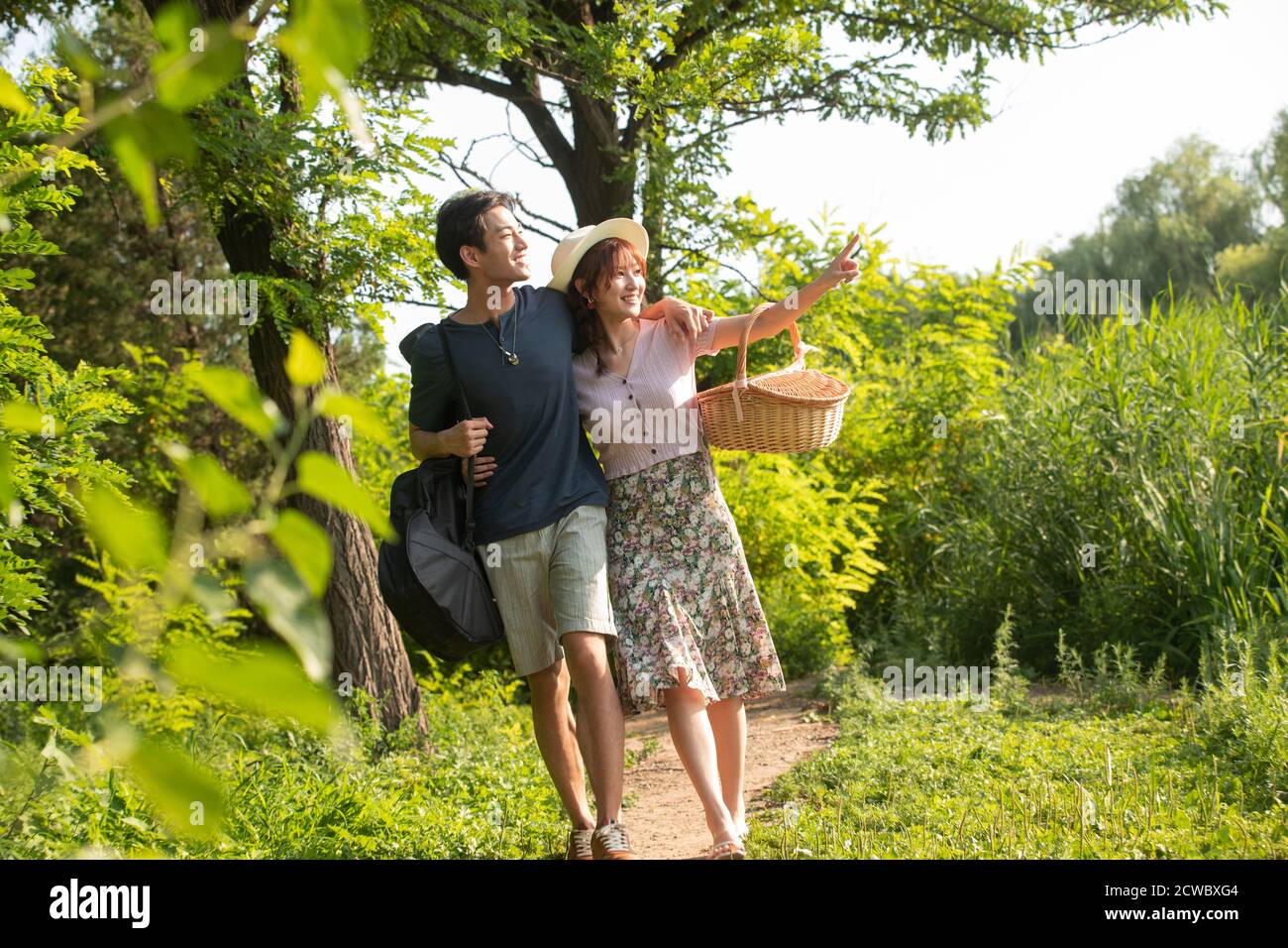 Happy couples in the park for an outing Stock Photo - Alamy