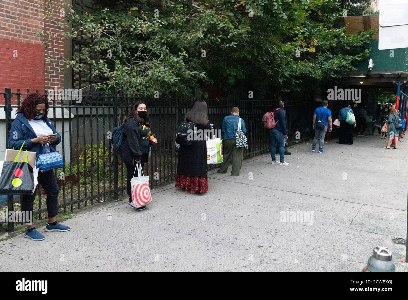 September 29, 2020: Teachers wait to go into their school PS 294 in ...