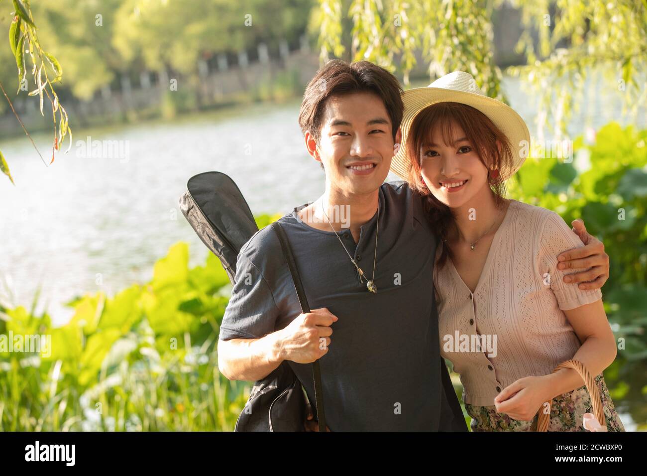 Happy couples in the park for an outing Stock Photo - Alamy