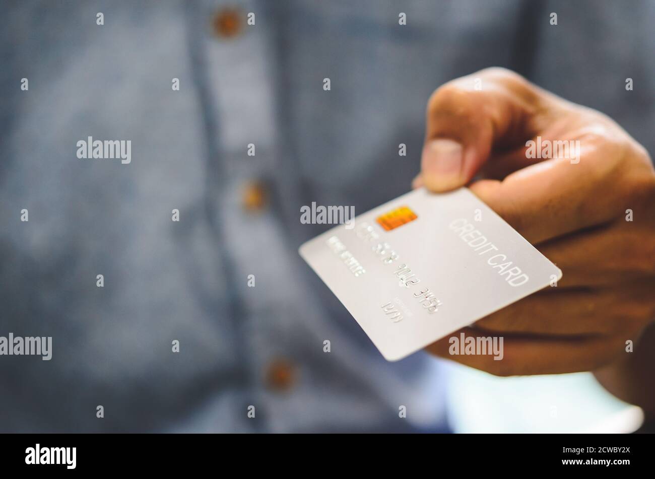 man hand holding credit cards.Online shopping by credit card.Credit ...