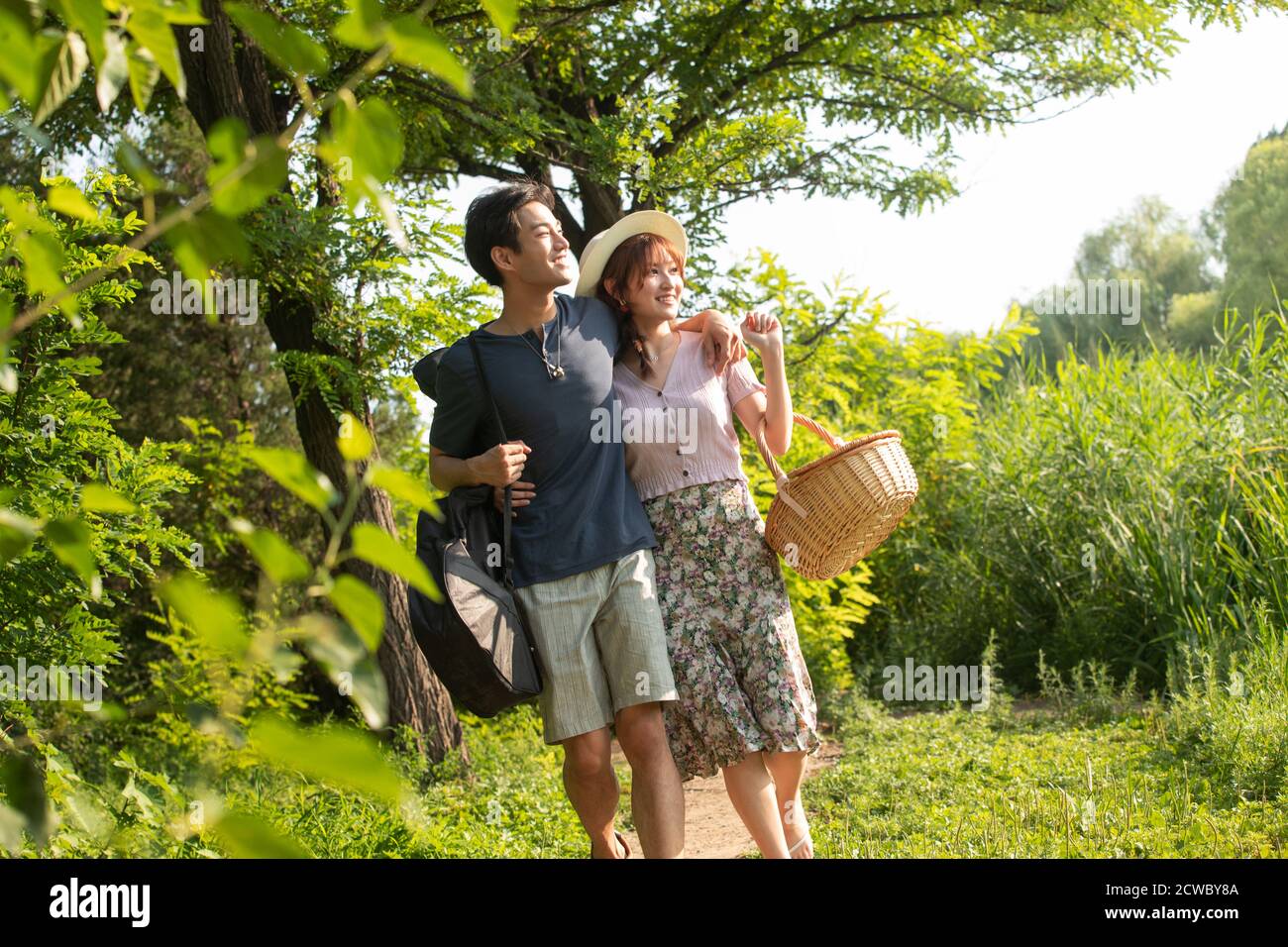 Happy couples in the park for an outing Stock Photo - Alamy
