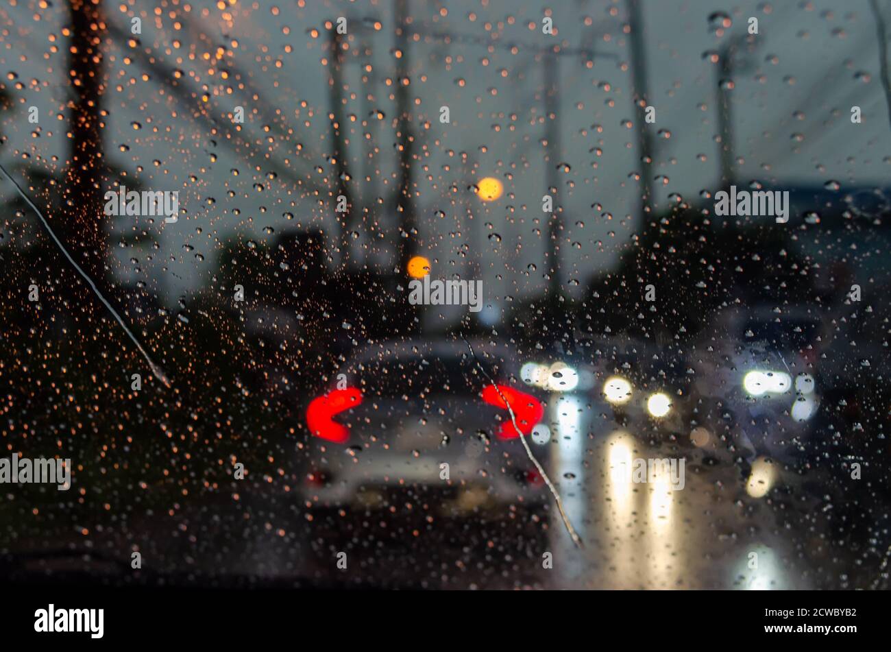 Car window Raindrops traffic jam at night Stock Photo - Alamy