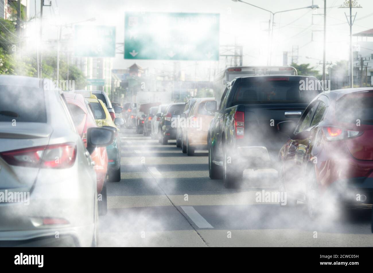 Smoke from the car exhaust on the road Stock Photo - Alamy