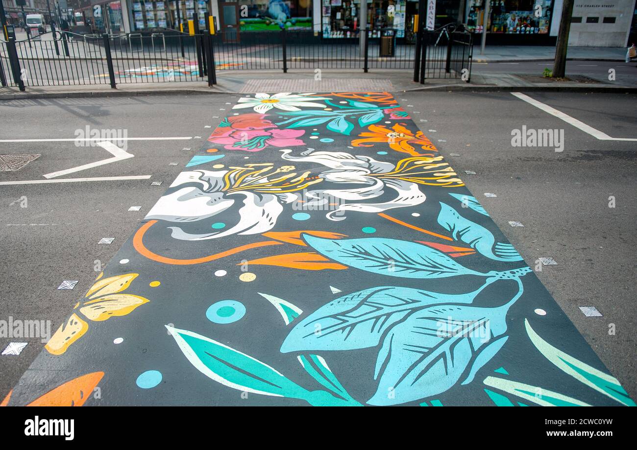 Leicester City Council commissioned artist Phil Blake to design two colourful pedestrian ...