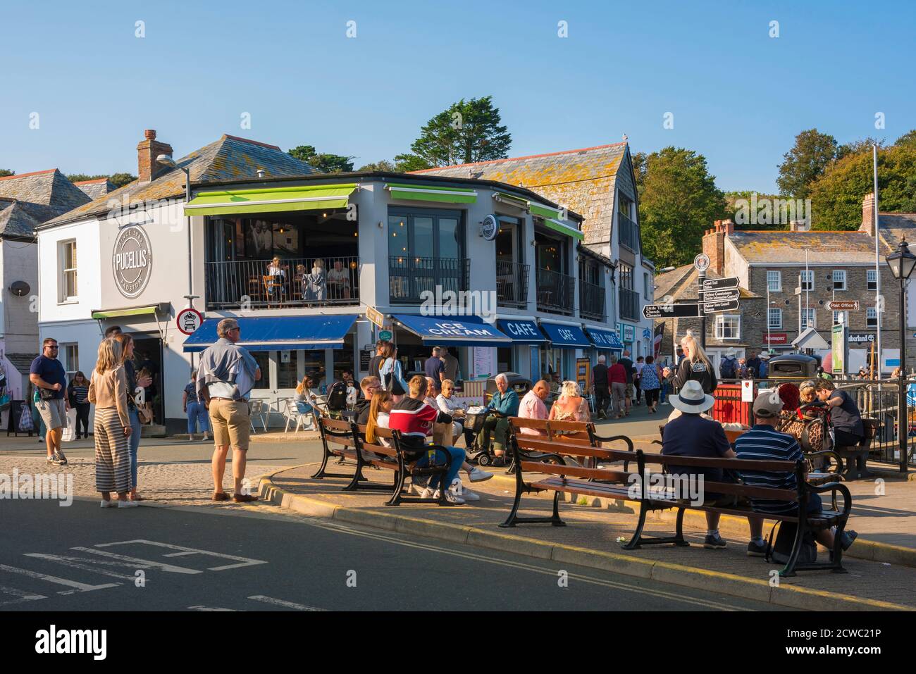 Padstow town, view in summer of people relaxing on The Strand inside ...