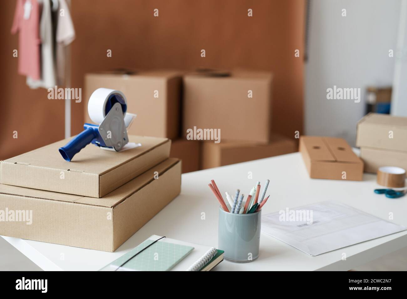 Image of cardboard packages on the table prepared for delivery at ...