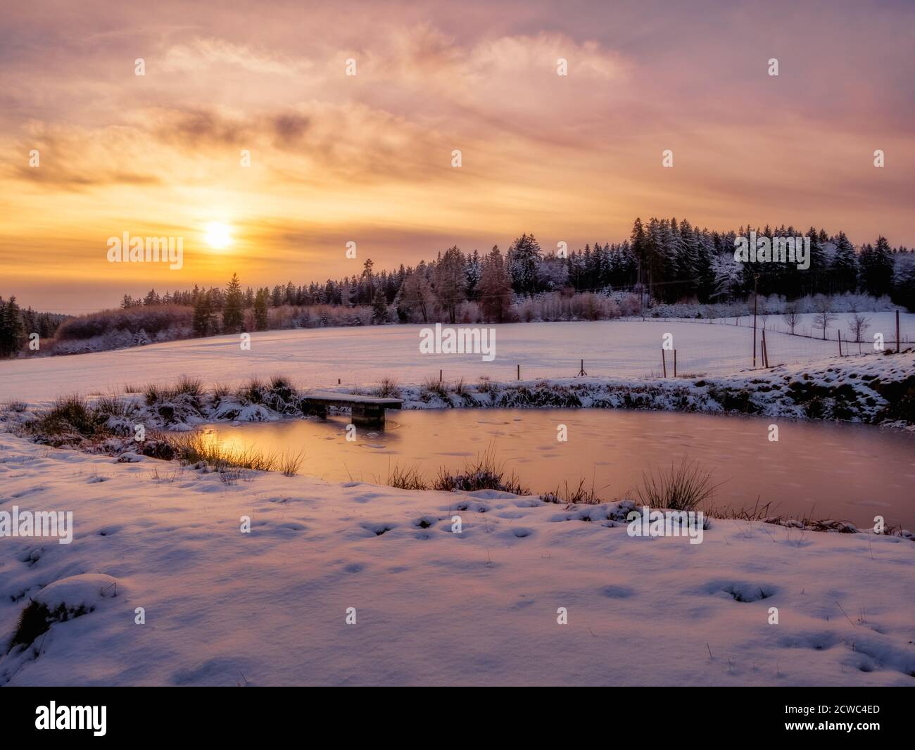 Frozen lake sunset landscape hi-res stock photography and images - Alamy
