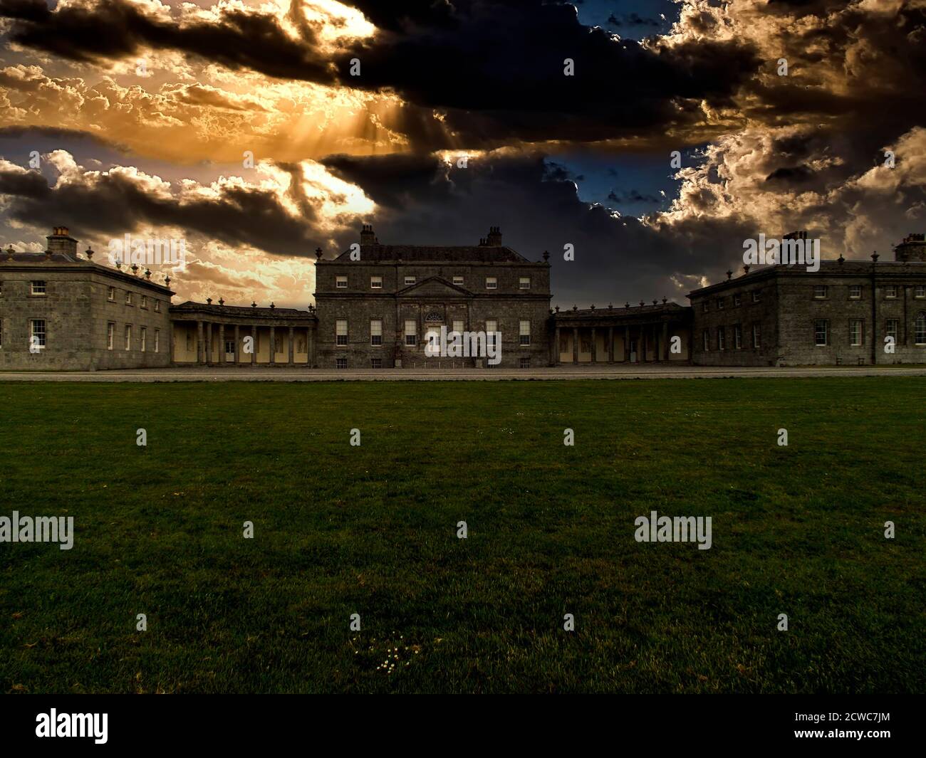 Majestic old Irish residence under a dramatic sky Stock Photo - Alamy