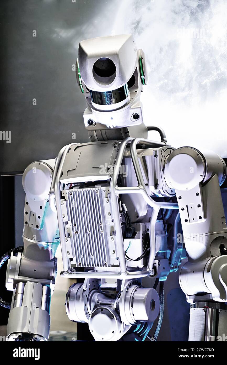Metal robot in space background Stock Photo - Alamy