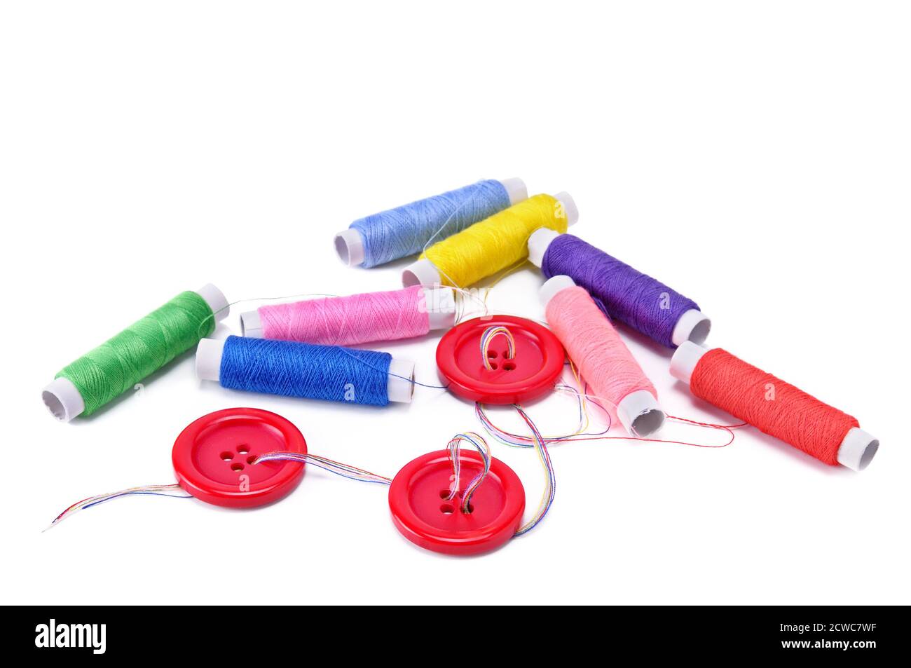 Sewing thread and buttons isolated on white background. Flat lay, top ...