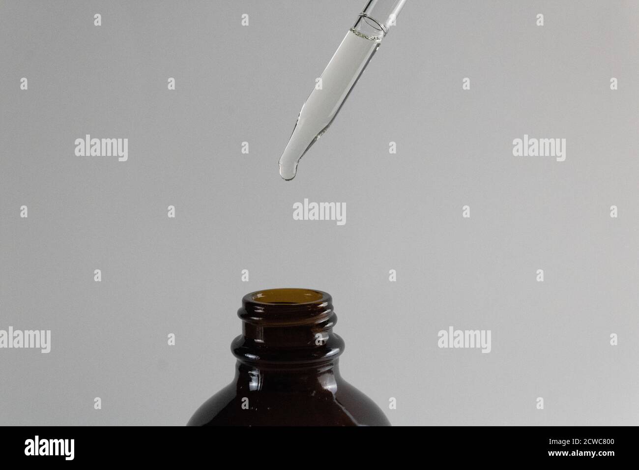 Closeup shot of empty transparent dropper bottle with pipette Stock ...