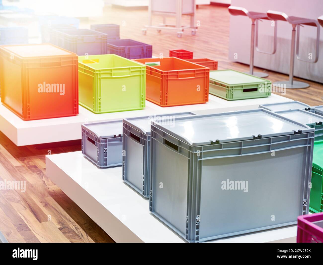 Color plastic tools boxes in hardware store Stock Photo - Alamy