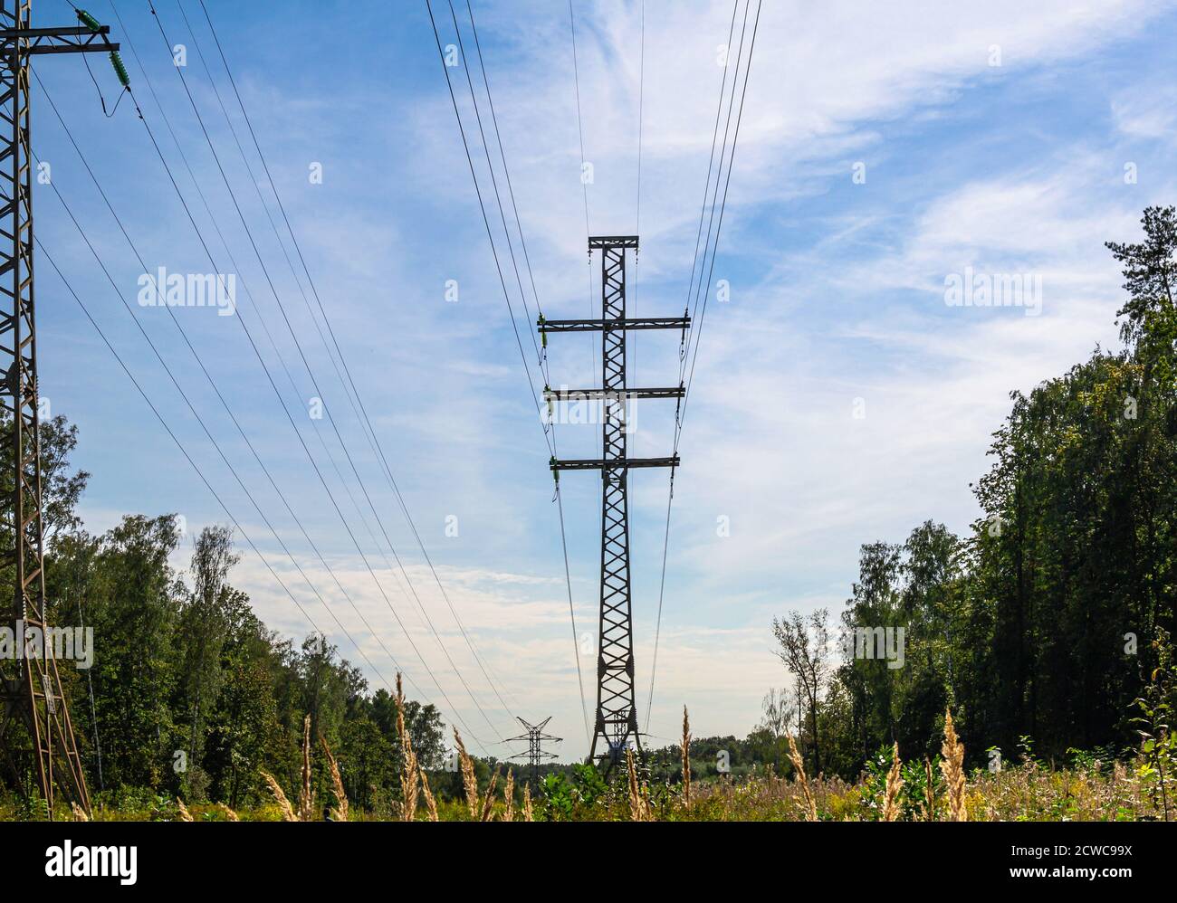 Energy distribution high voltage power line tower landscape with wires ...