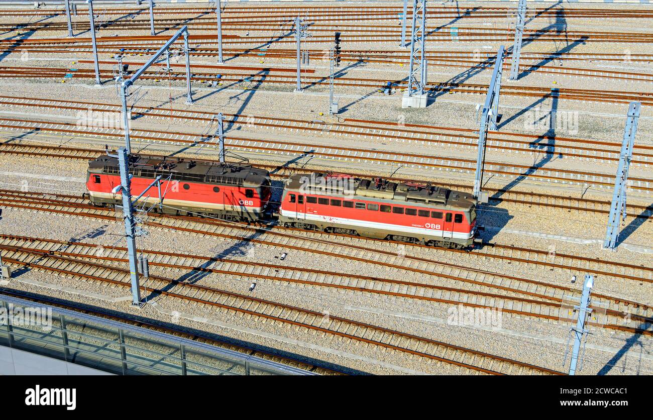 view onto a modern track system with two electric locomotives of the ...