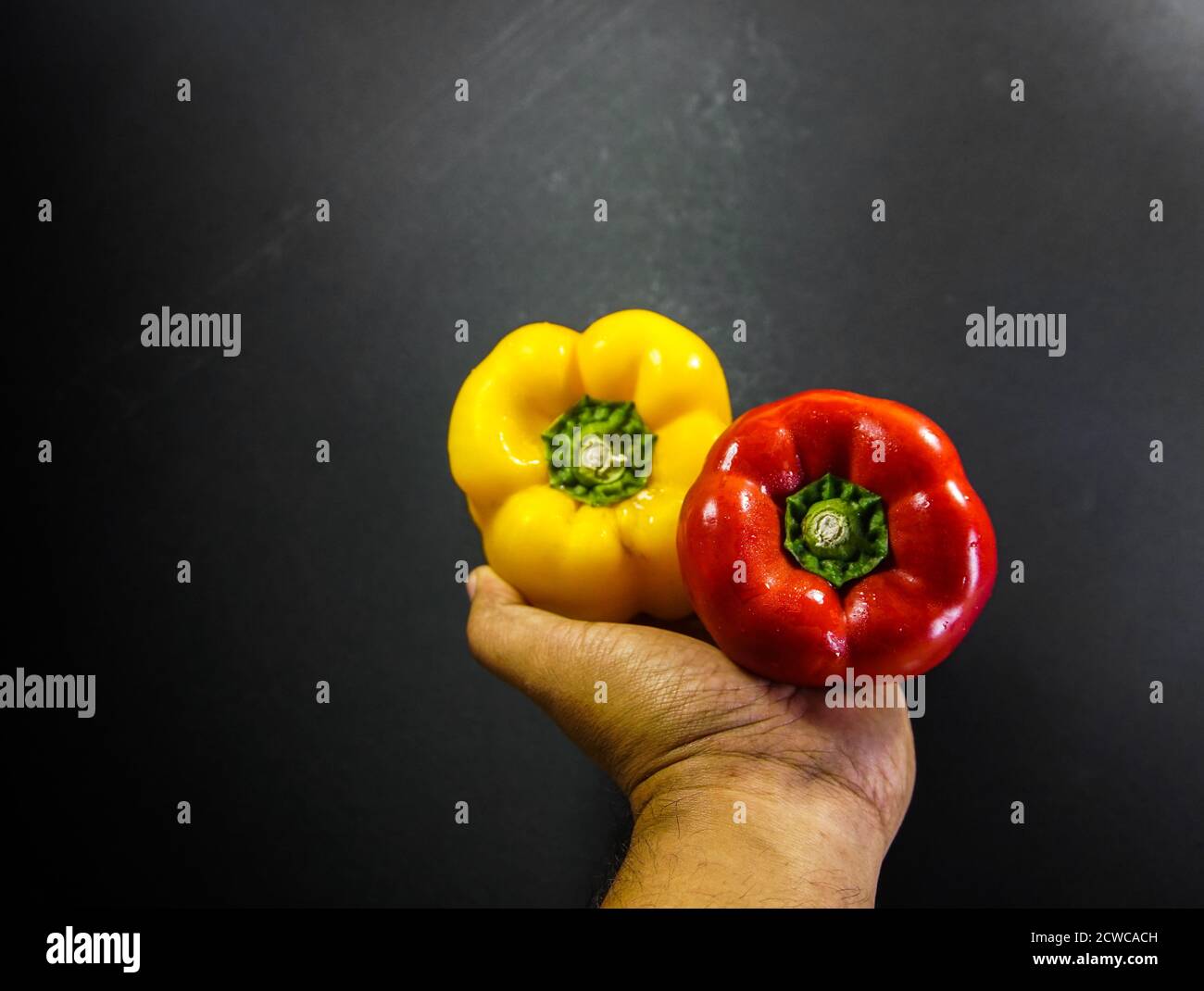 Colorful capsicum on wooden table background Stock Photo - Alamy