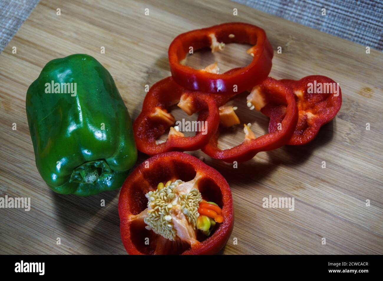 Colorful capsicum on wooden table background Stock Photo - Alamy