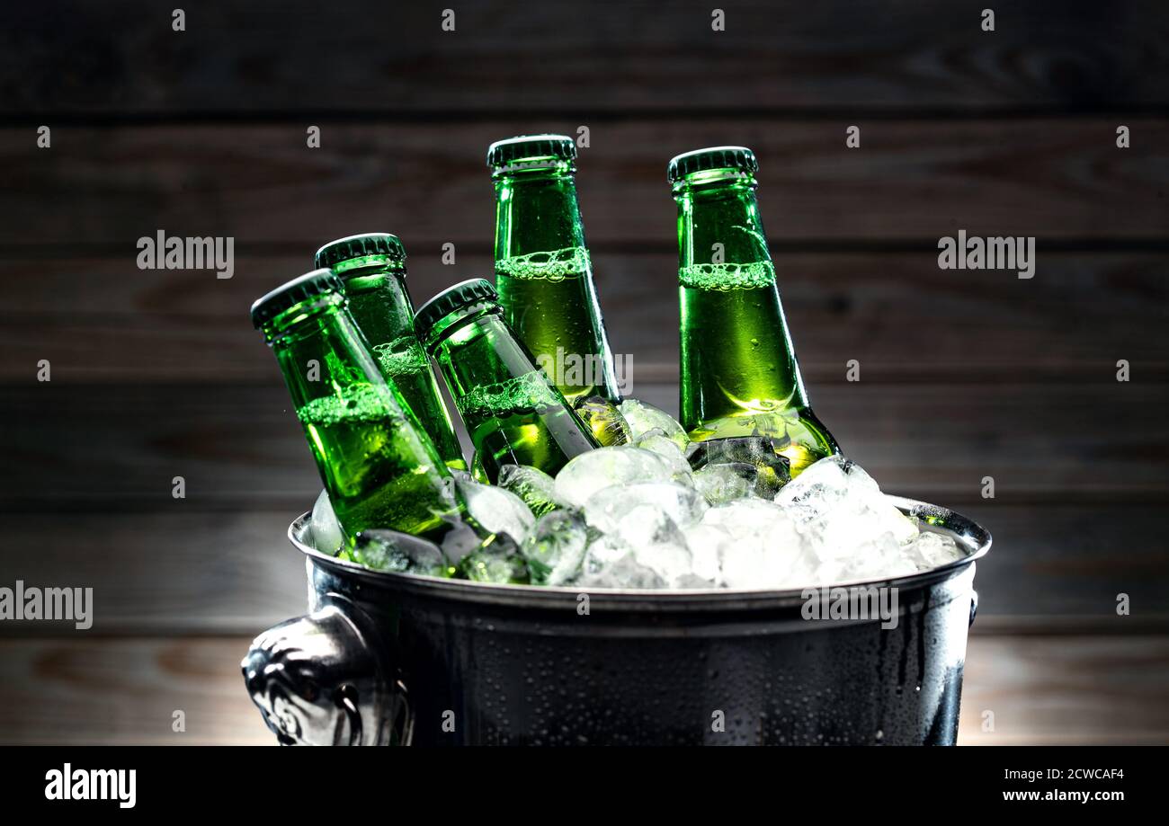 Ice bucket cold beer Stock Photo - Alamy