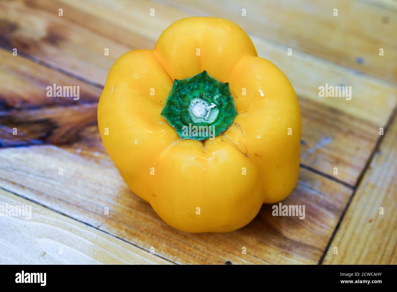 Colorful capsicum on wooden table background Stock Photo - Alamy