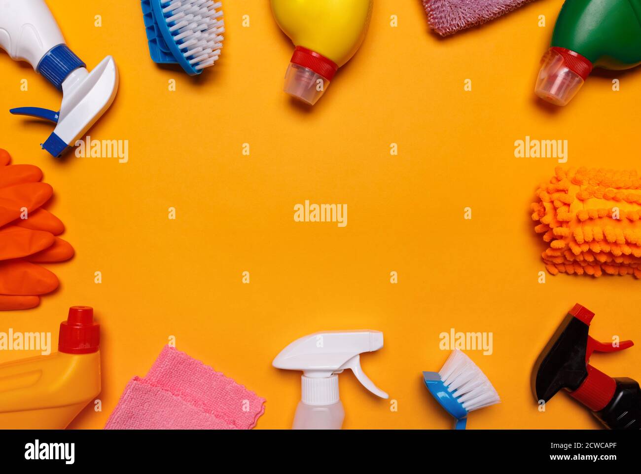 means for cleaning the house on a yellow background. place for text ...