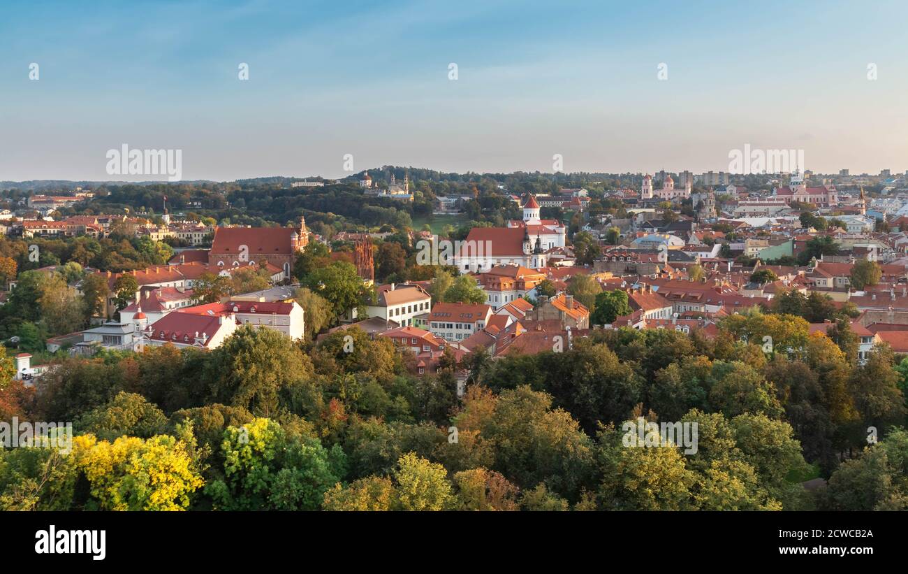 Vilnius panoramic view. Streets and roofs of old Vilnius at sunset. The ...