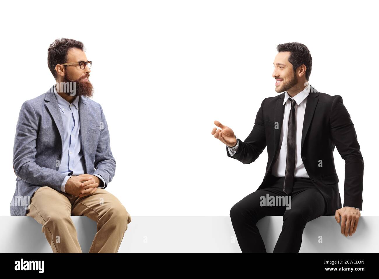 Men sitting on a panel and having a conversation isolated on white ...