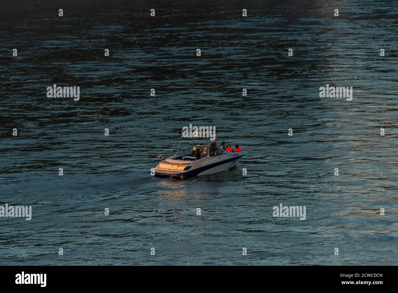 Bratislava capital in summer evening with color sunset boat and blue ...