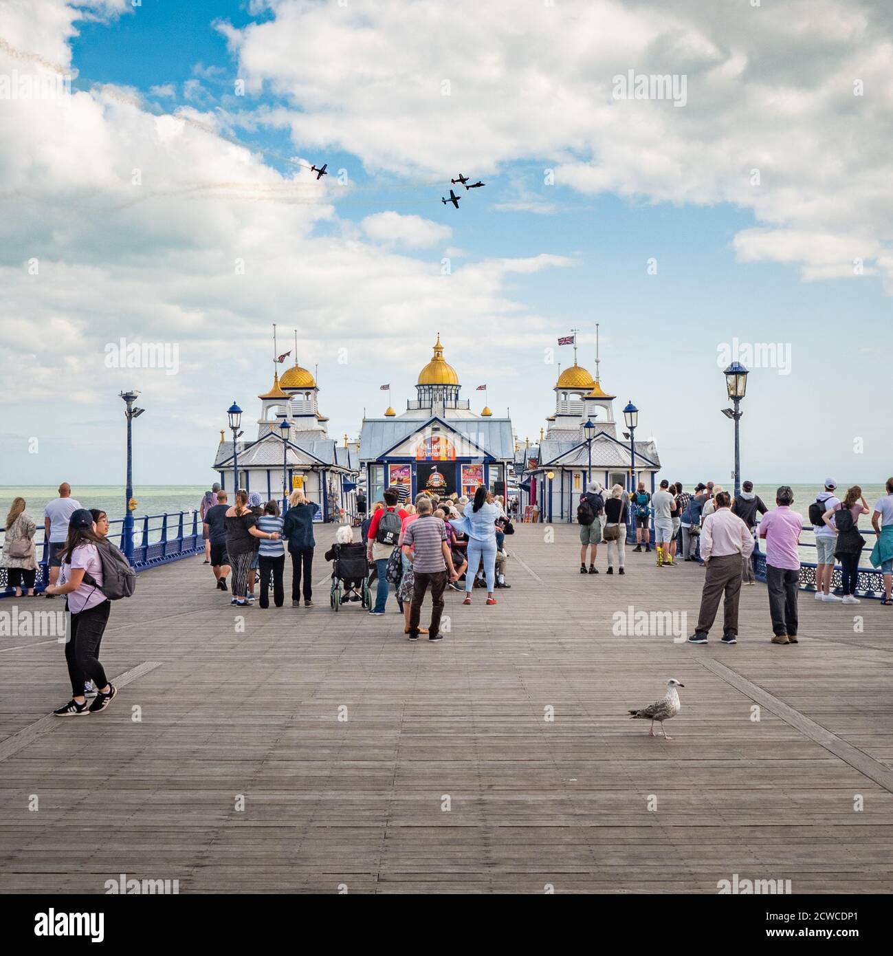 Eastbourne Airborne Airshow. Tourists enjoying an aerobatic air show ...