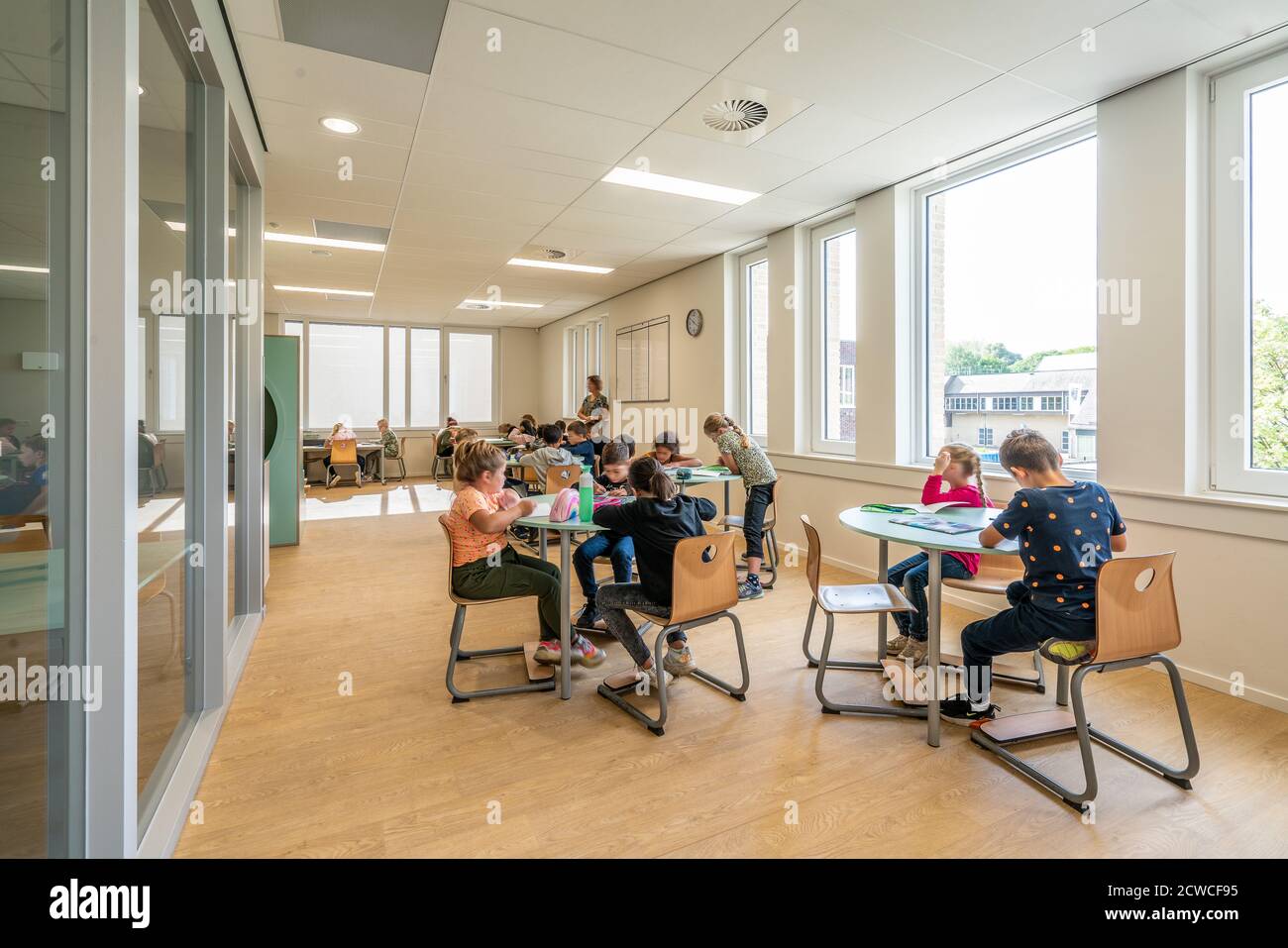 ARNHEM / NETHERLANDS - AUGUST 28 2020: Children in primary school work ...