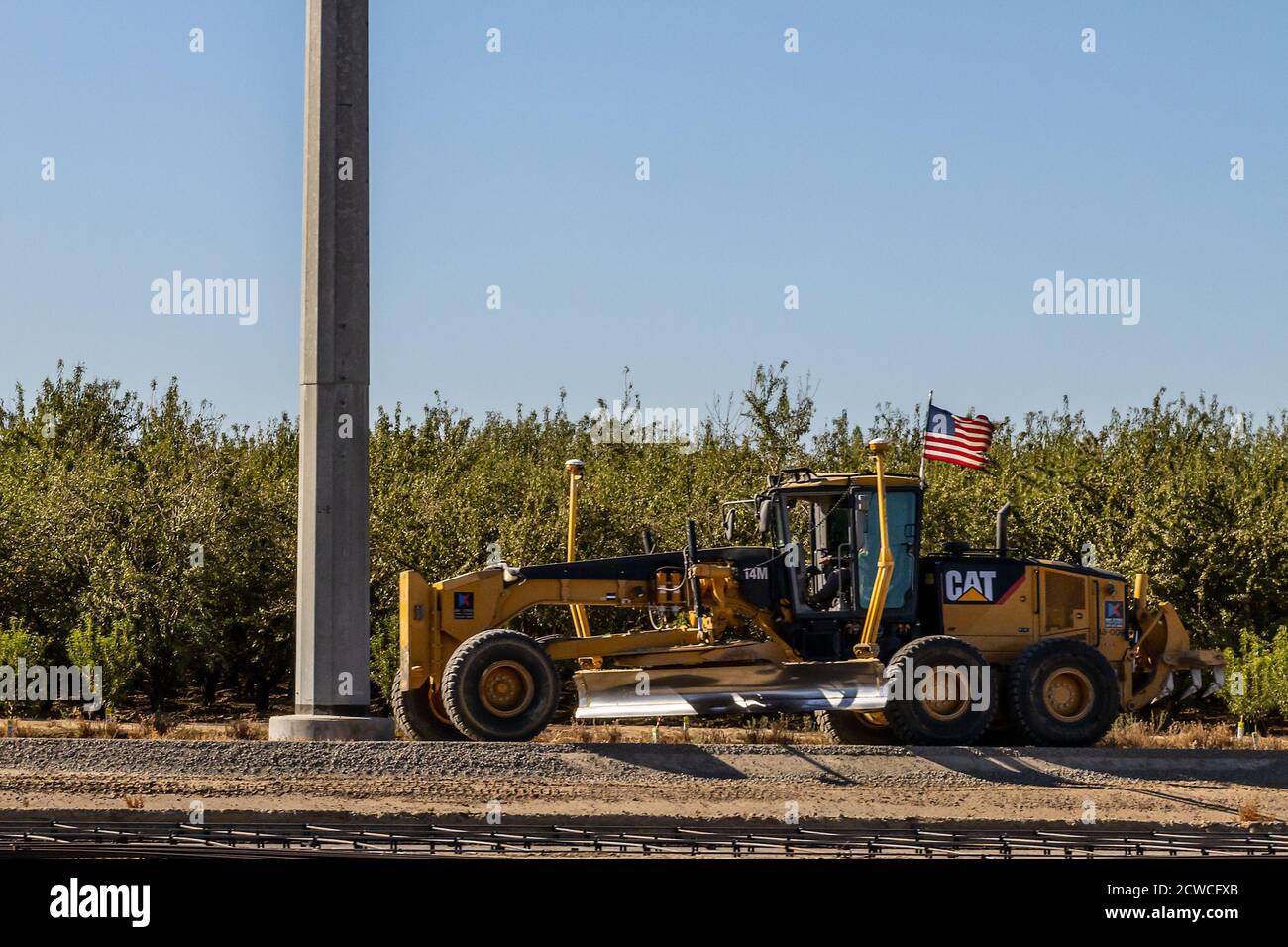 A Road Grader works at the rerouting of Highway 132 in Modesto ...