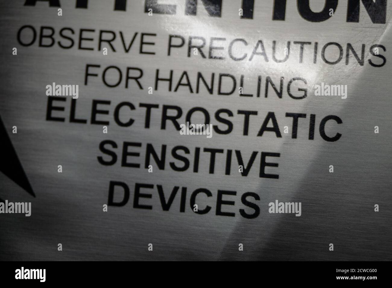 Close-up of ESD protected moisture barrier vacuum bag caution warning ...