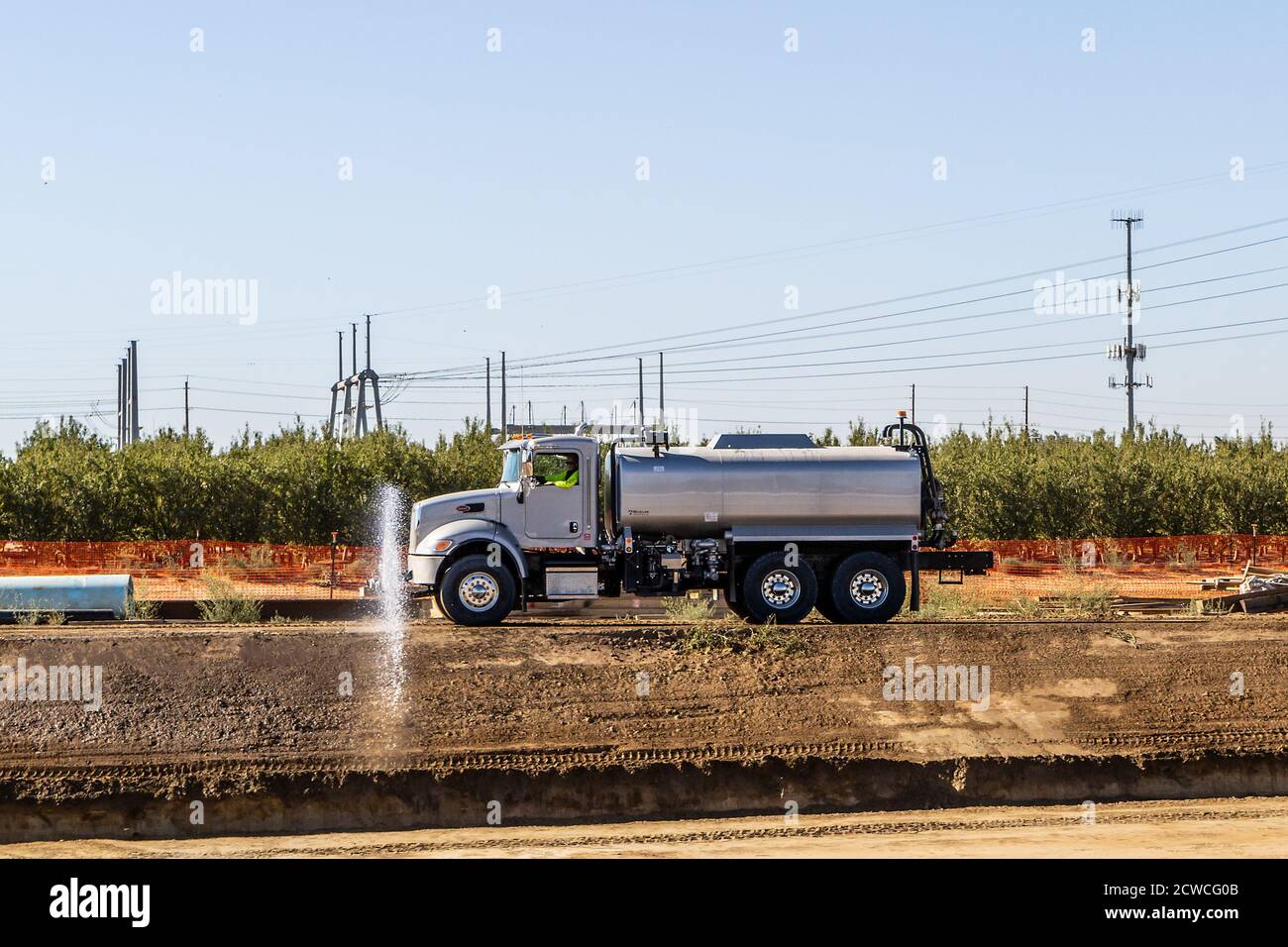 A water truck used for dust mitigation at the rerouting of Highway 132 ...