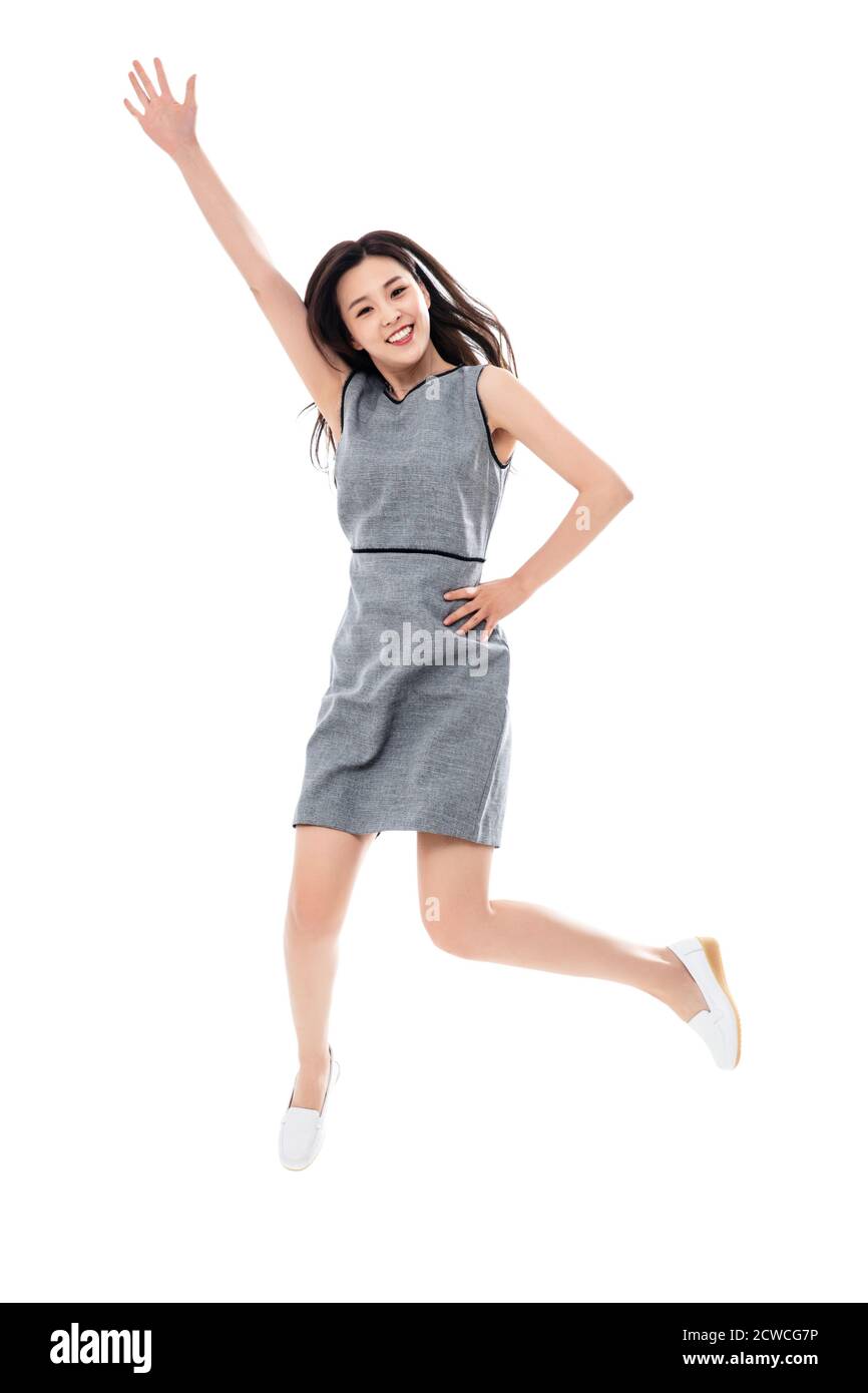 Excited jumping business lady Stock Photo - Alamy