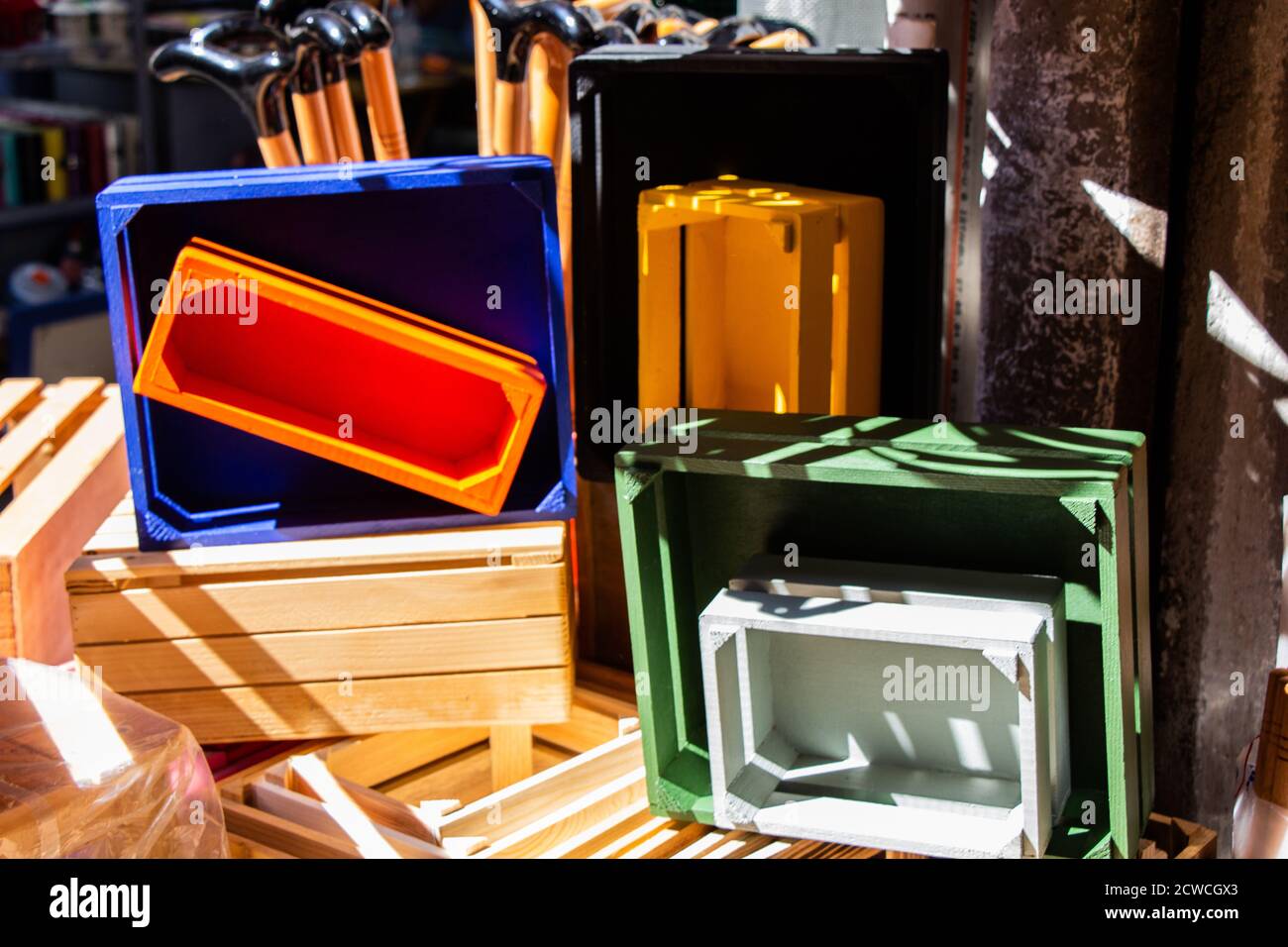 Colorful wooden crates stuck on each other in the market Stock Photo ...