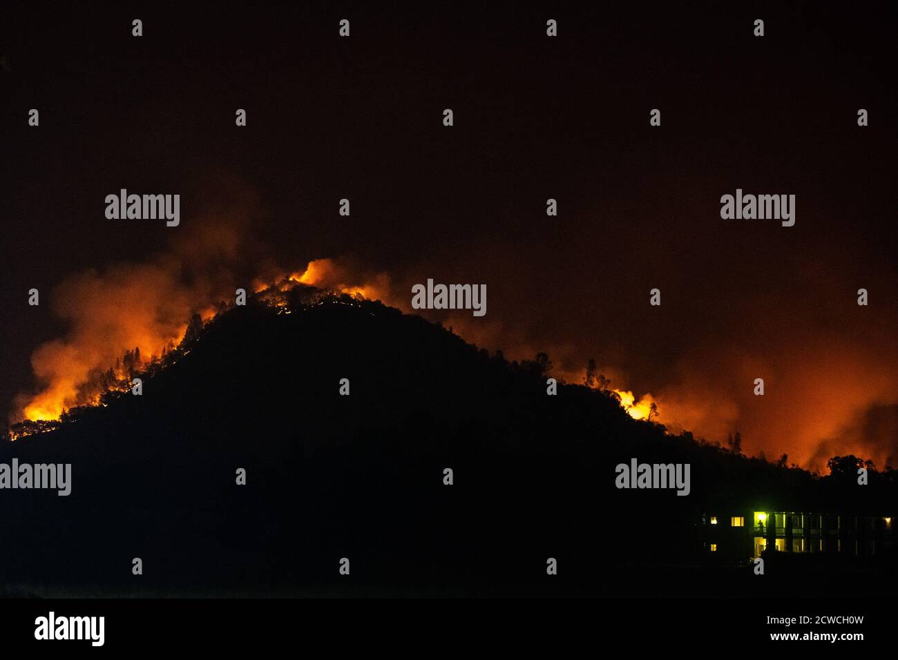 CALISTOGA, CA - SEPTEMBER 28: Wildfire flames from the Glass Fire ...