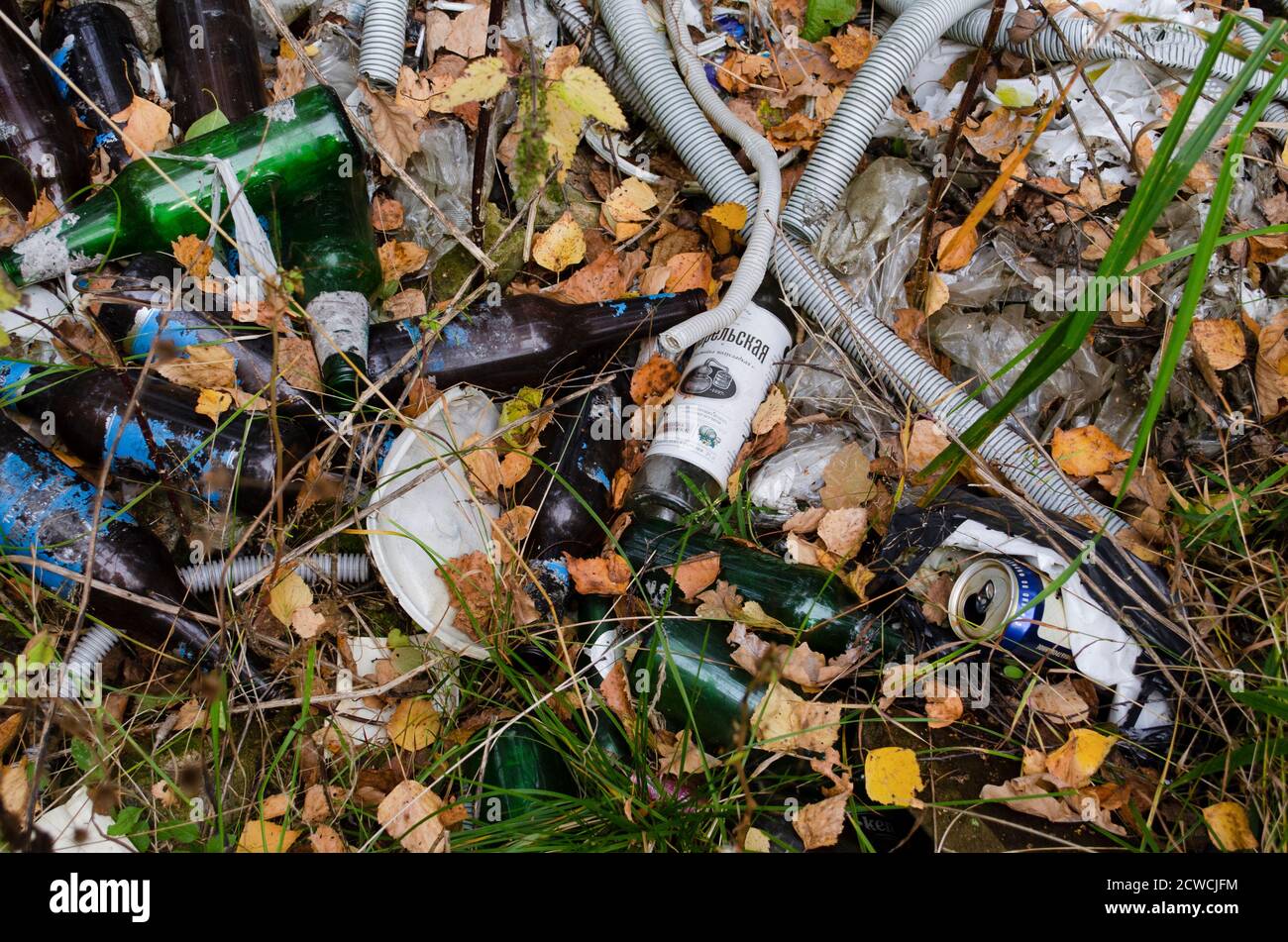 Plastic pollution forest nature bottles hi-res stock photography and ...