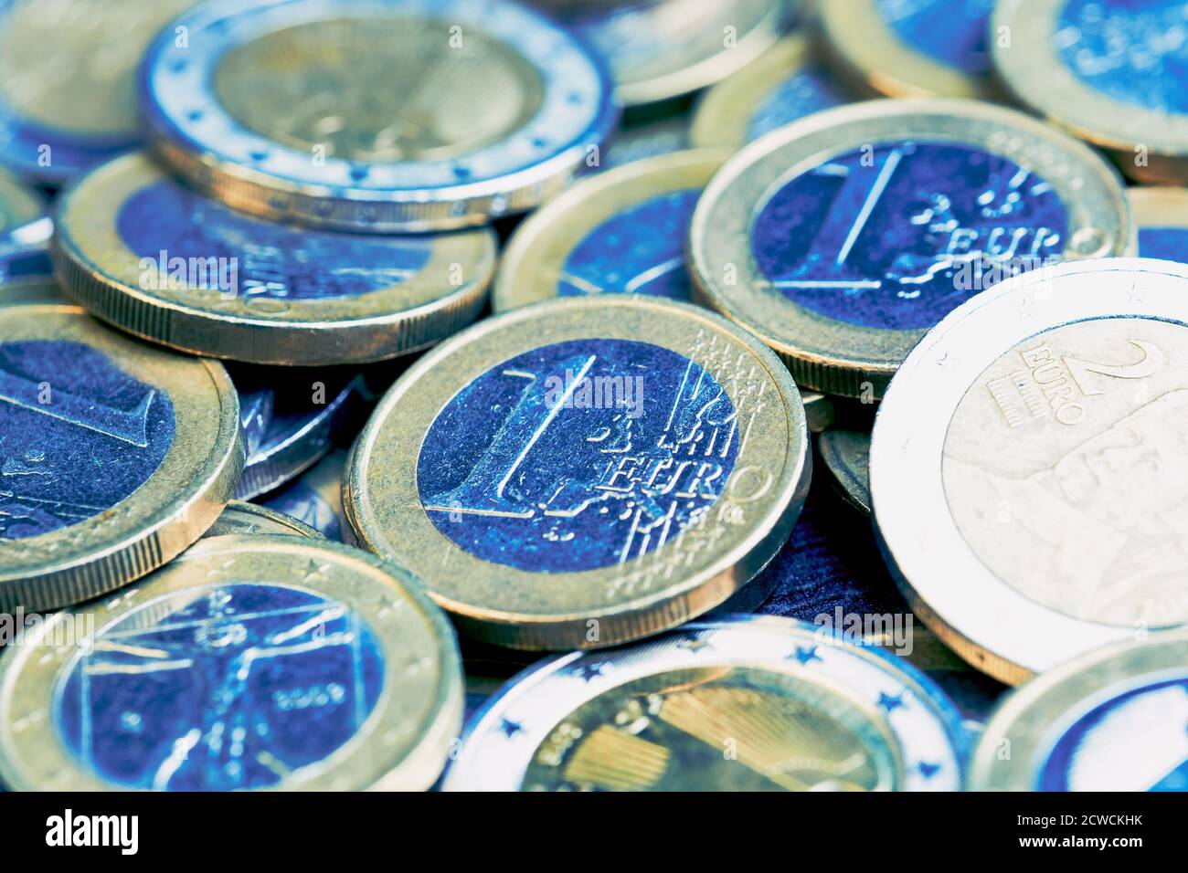 colored picture background with one and two Euro coins, format filling ...