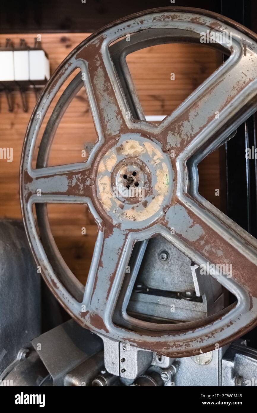 Old and rusty wheel of an antique movie projector Stock Photo - Alamy