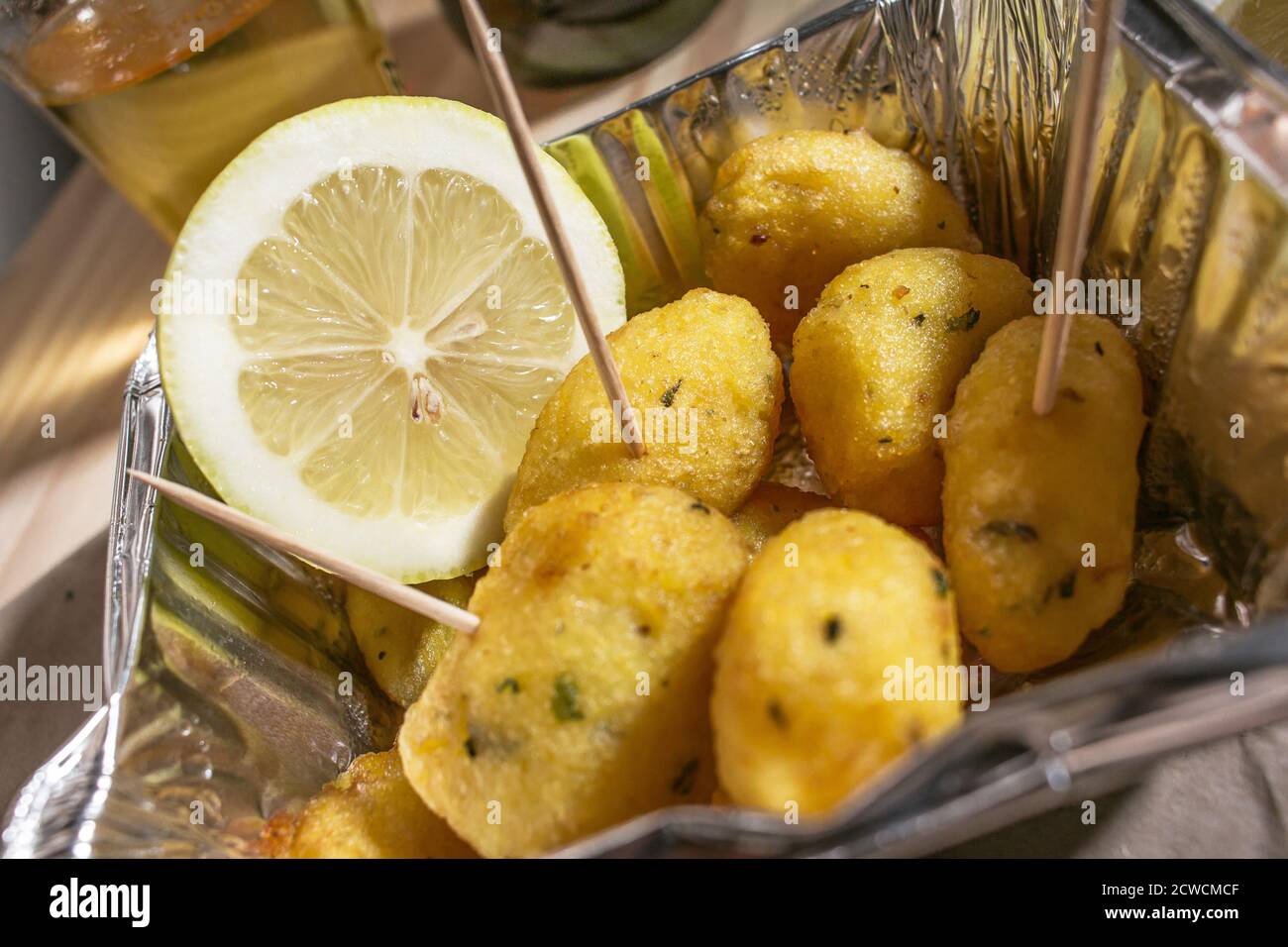 Sicilian street food, potato croquettes called "crocchè" served in an ...