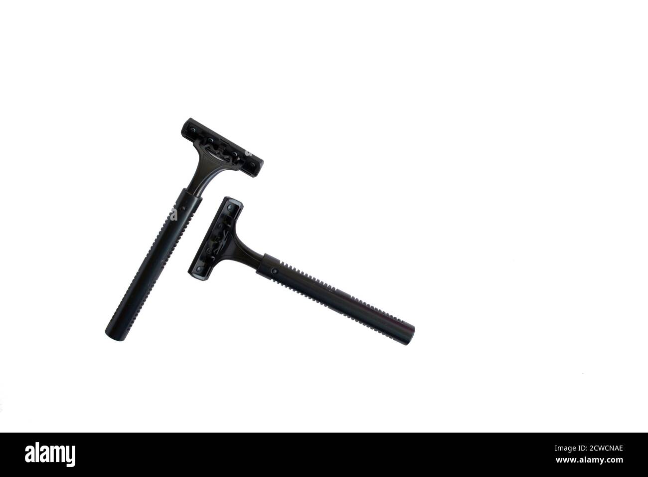 Two disposable black razors isolated Stock Photo - Alamy