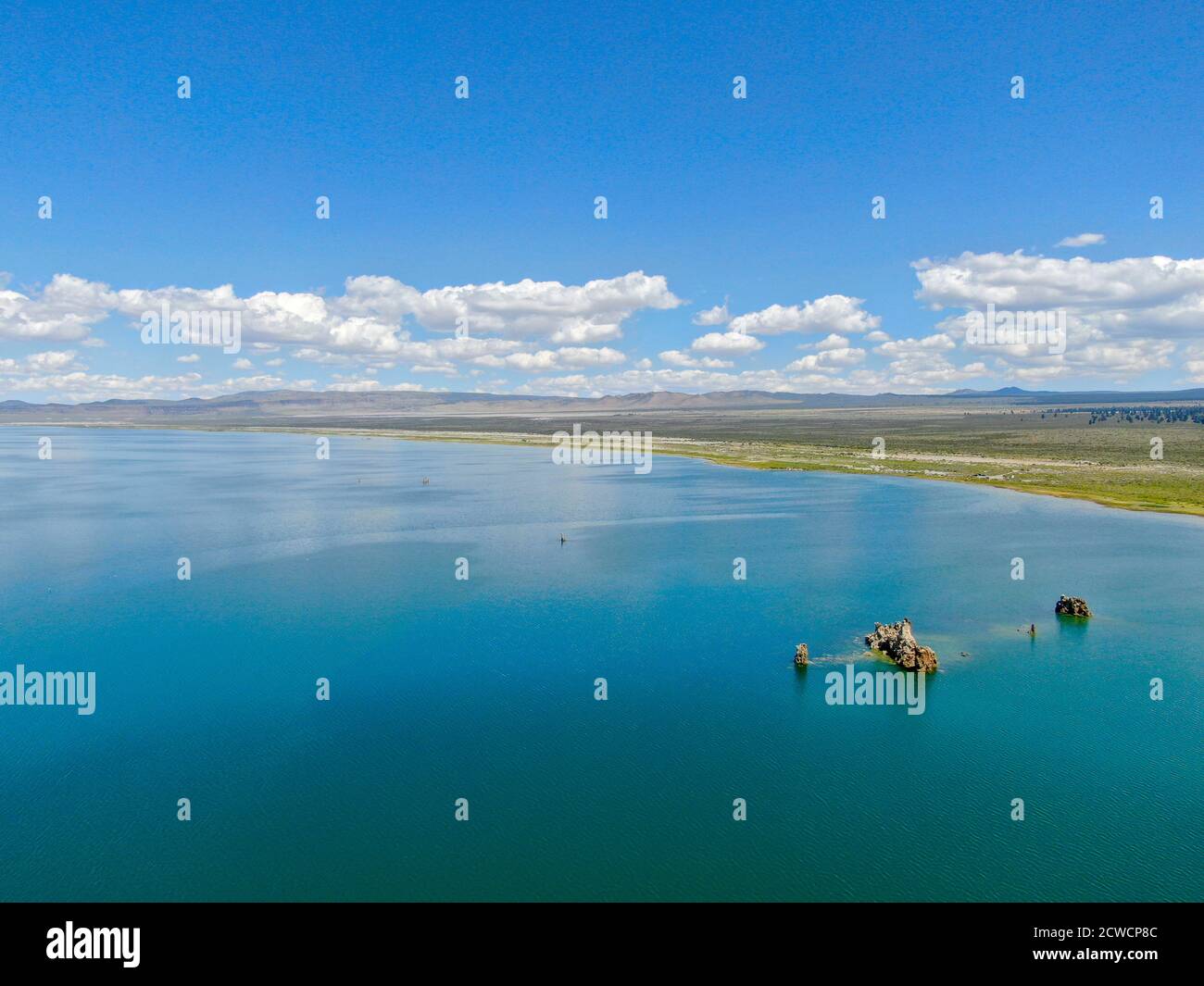 Aerial view of Mono Lake with tufa rock formations during summer season ...